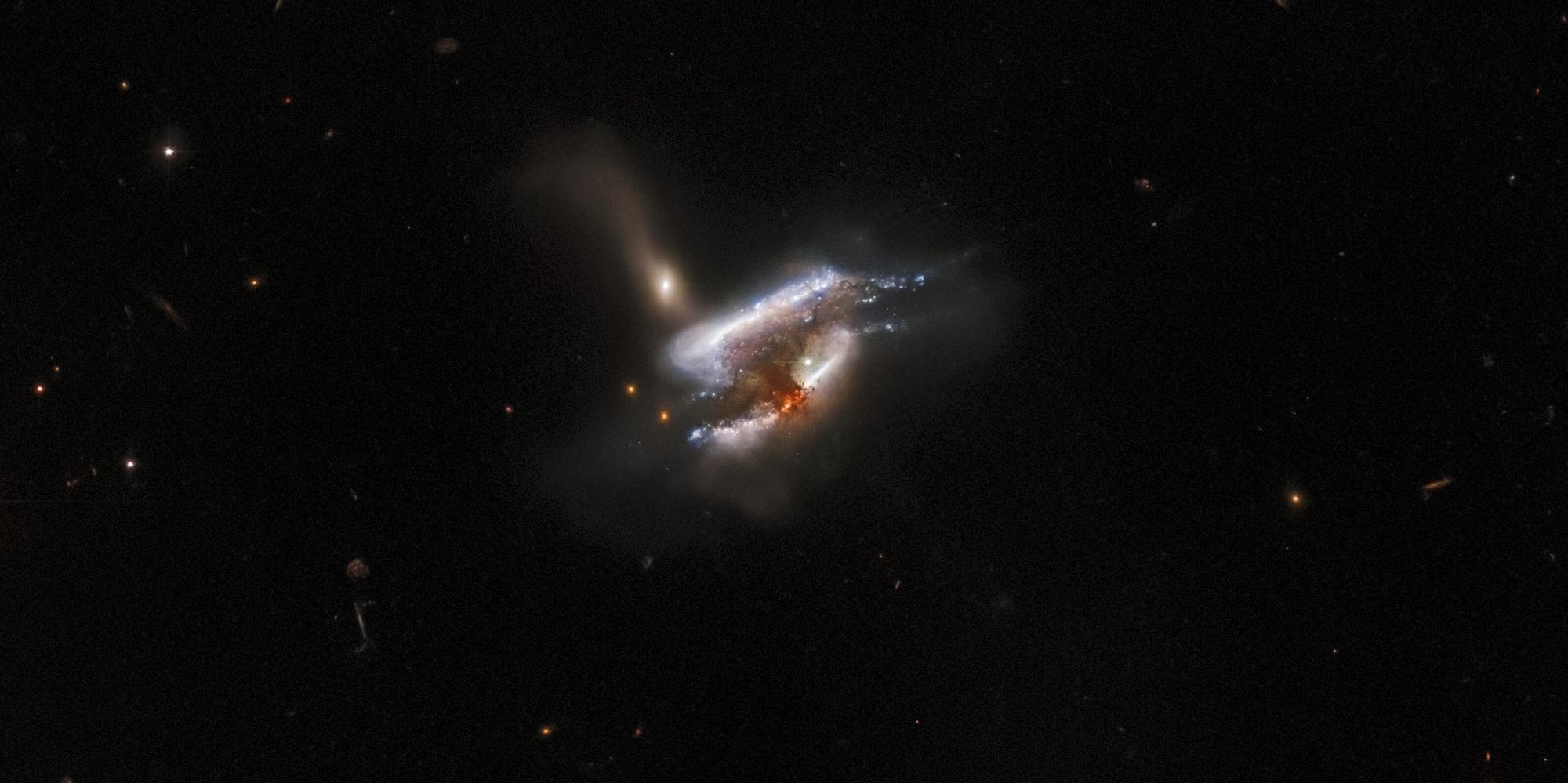 Hubble Captures Three Galaxies In One Photo, And It Looks Gorgeous